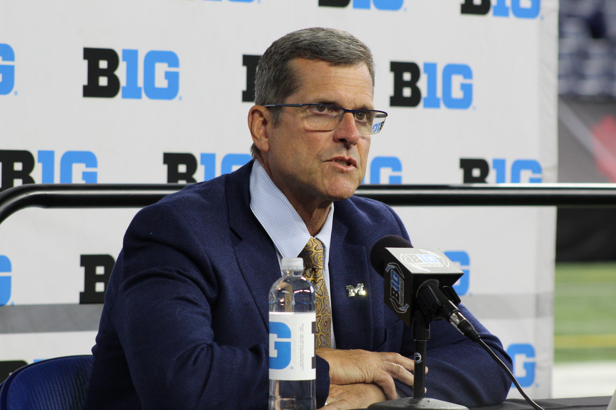 Former Michigan Head Coach Jim Harbaugh, Athletic Director Warde Manuel ...